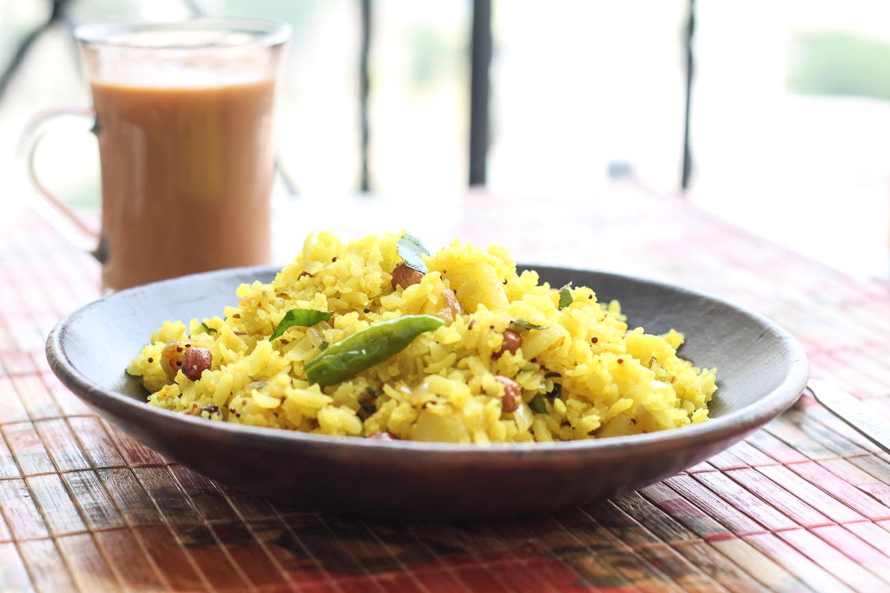 Delicious Aloo Poha Recipe (Batata Poha): A Quick and Eas... | Archana ...