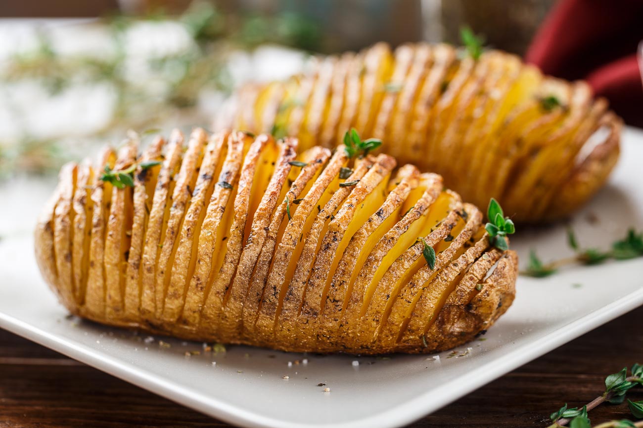 Delicious Herbed Hasselback Potatoes Recipe | Archana's Kitchen